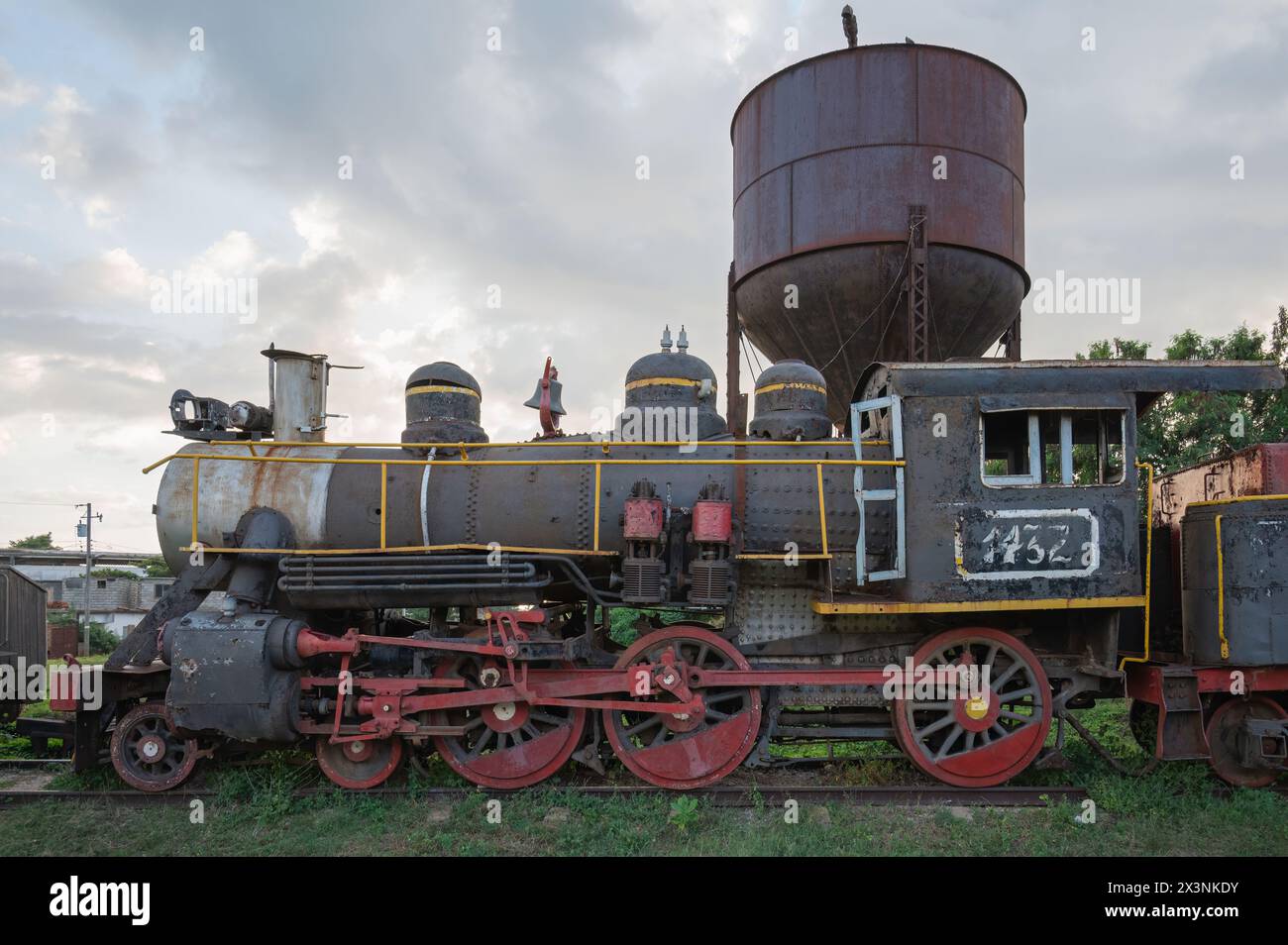 The partly dismantled, rusting remains of vintage steam engines lined ...