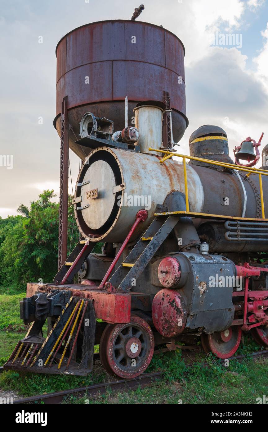 The partly dismantled, rusting remains of vintage steam engines lined ...