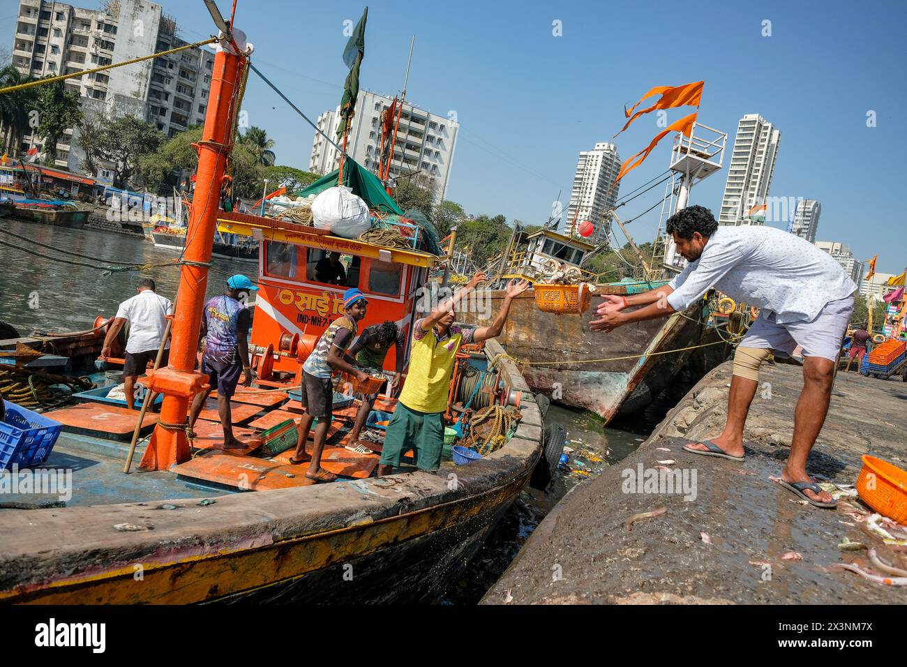 Mumbai, India - March 8, 2024: Fishermen at the Sassoon Dock in the ...