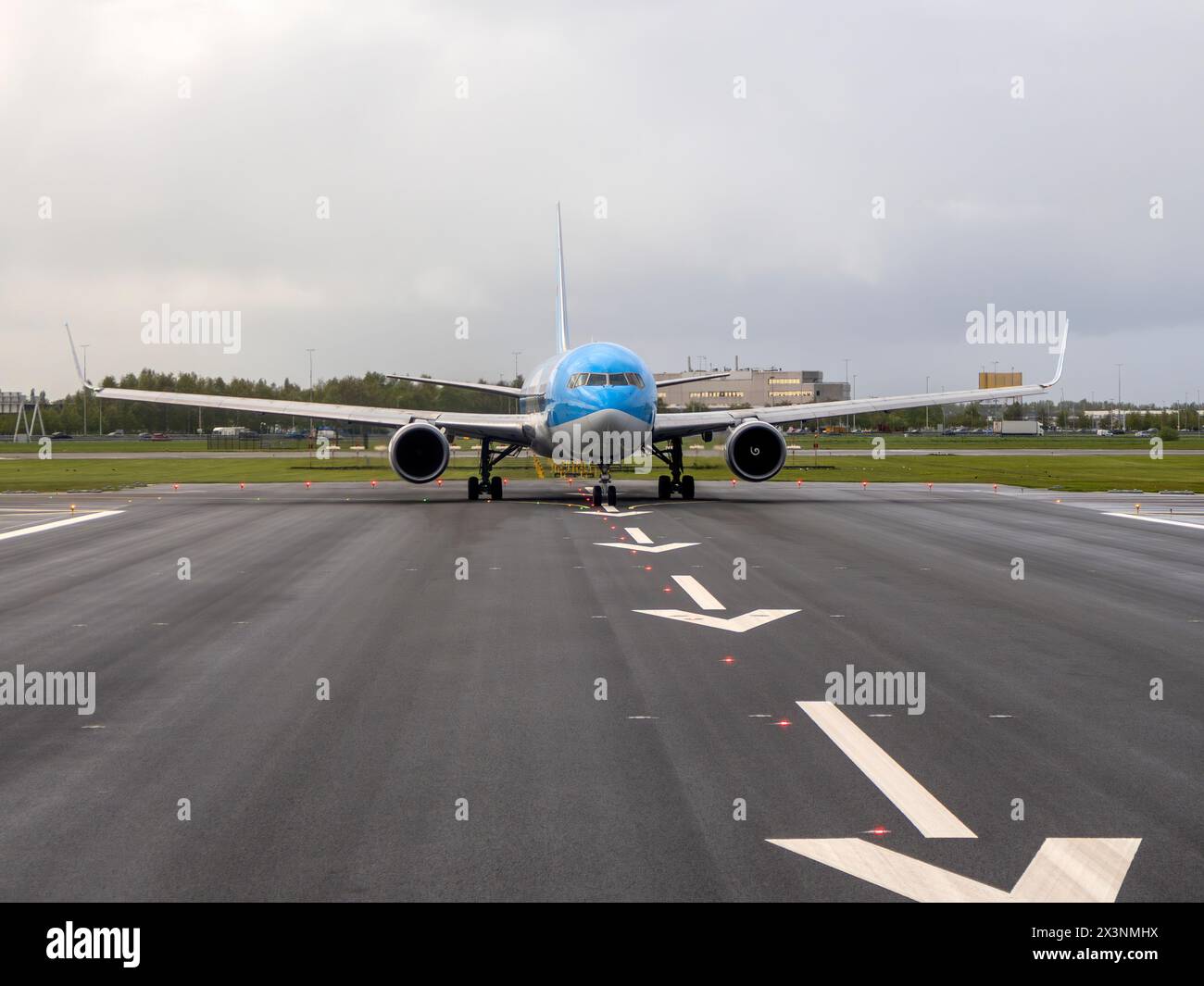 An airplaine on take off runway airstrip in Schipol Airport Stock Photo ...