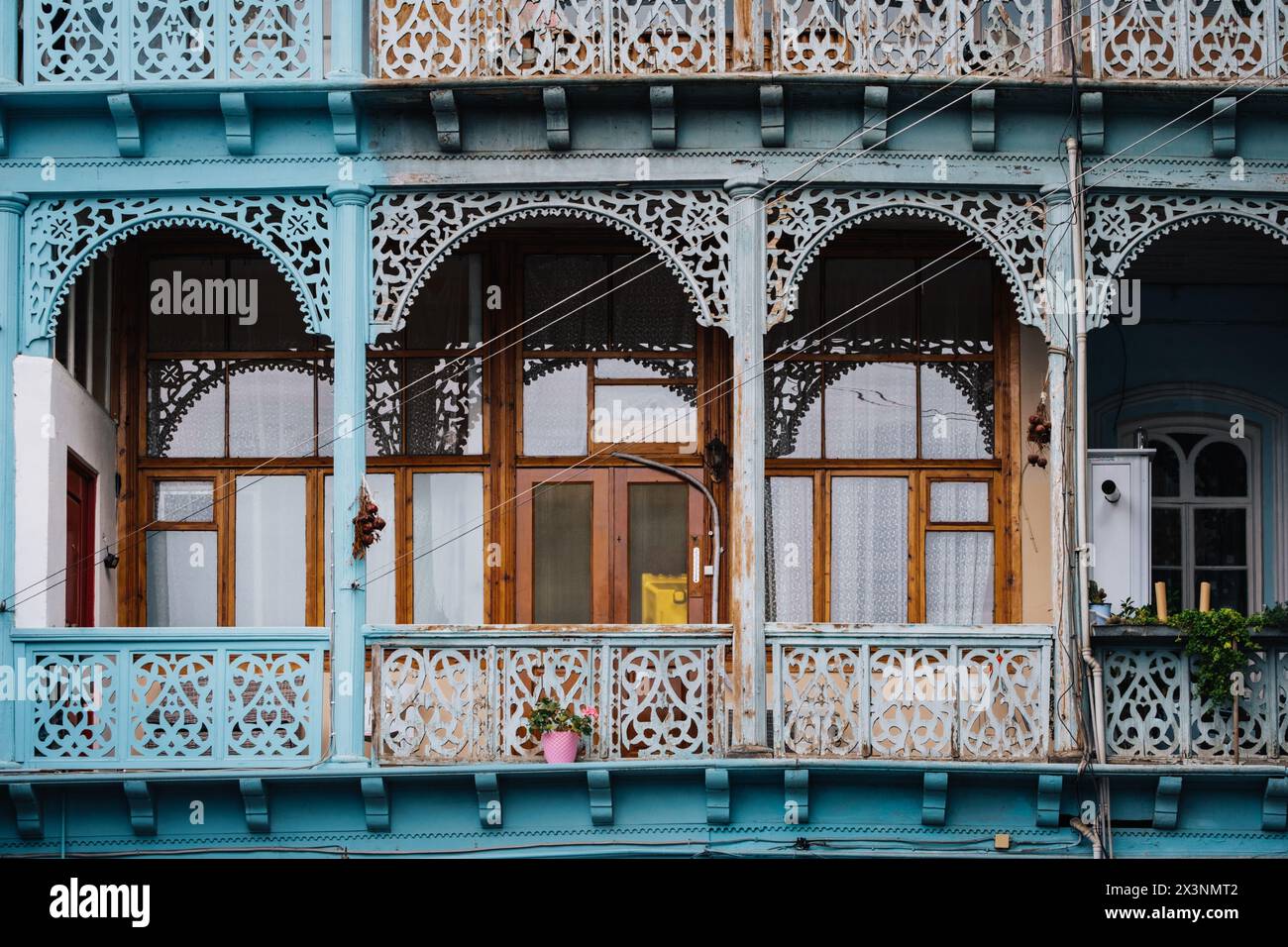 Details of the beeautifully carved wooden balconies of a traditional ...