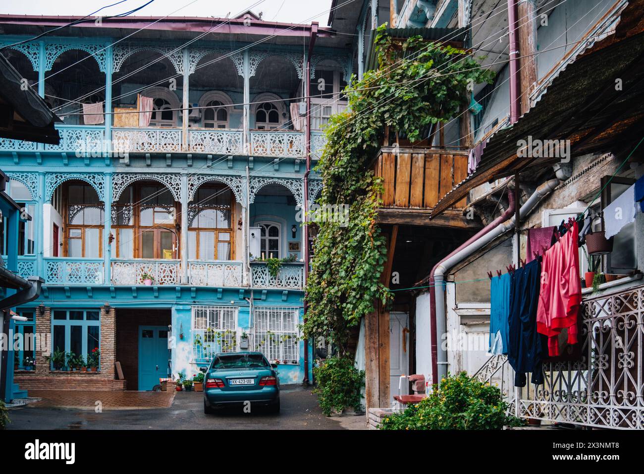Traditional Georgian house with beautifuly carved wooden balconies ...