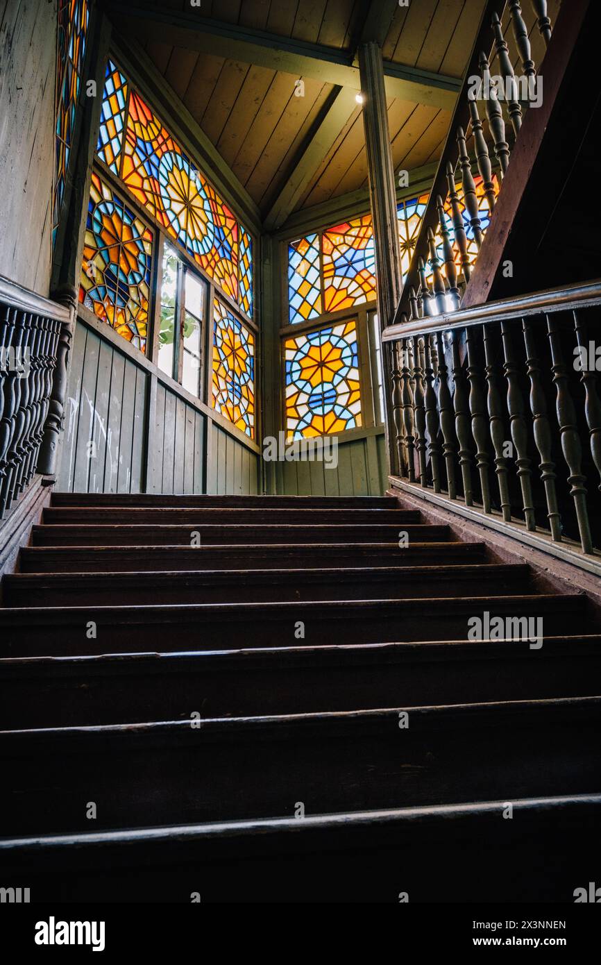 Beautiful stained glass windows and old wooden stairs of Gallery 27, in ...