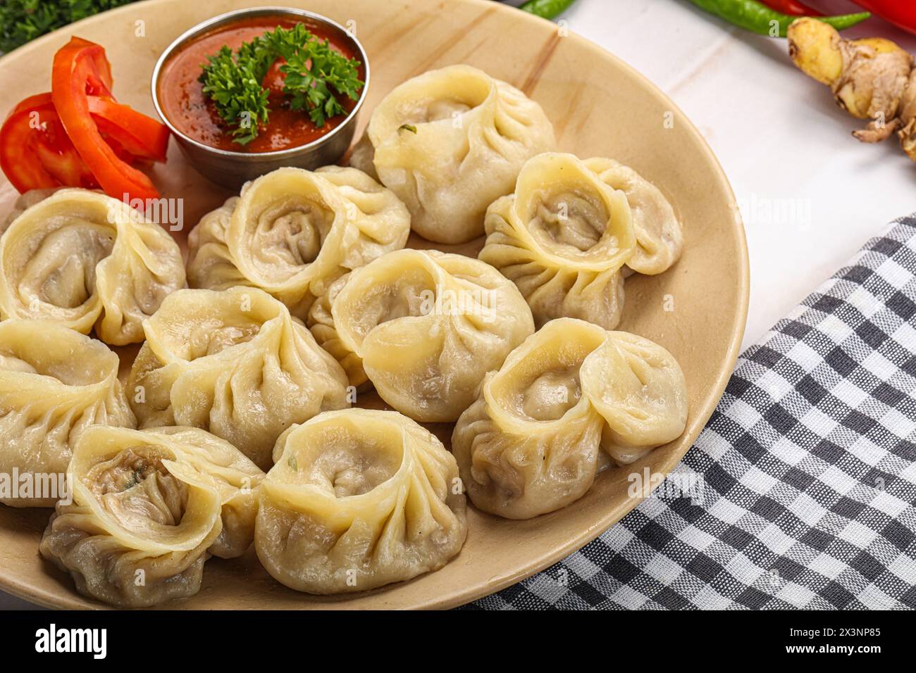 Steamed Nepali dumpling Momo with sauce stuffed chicken, meat, seafood ...