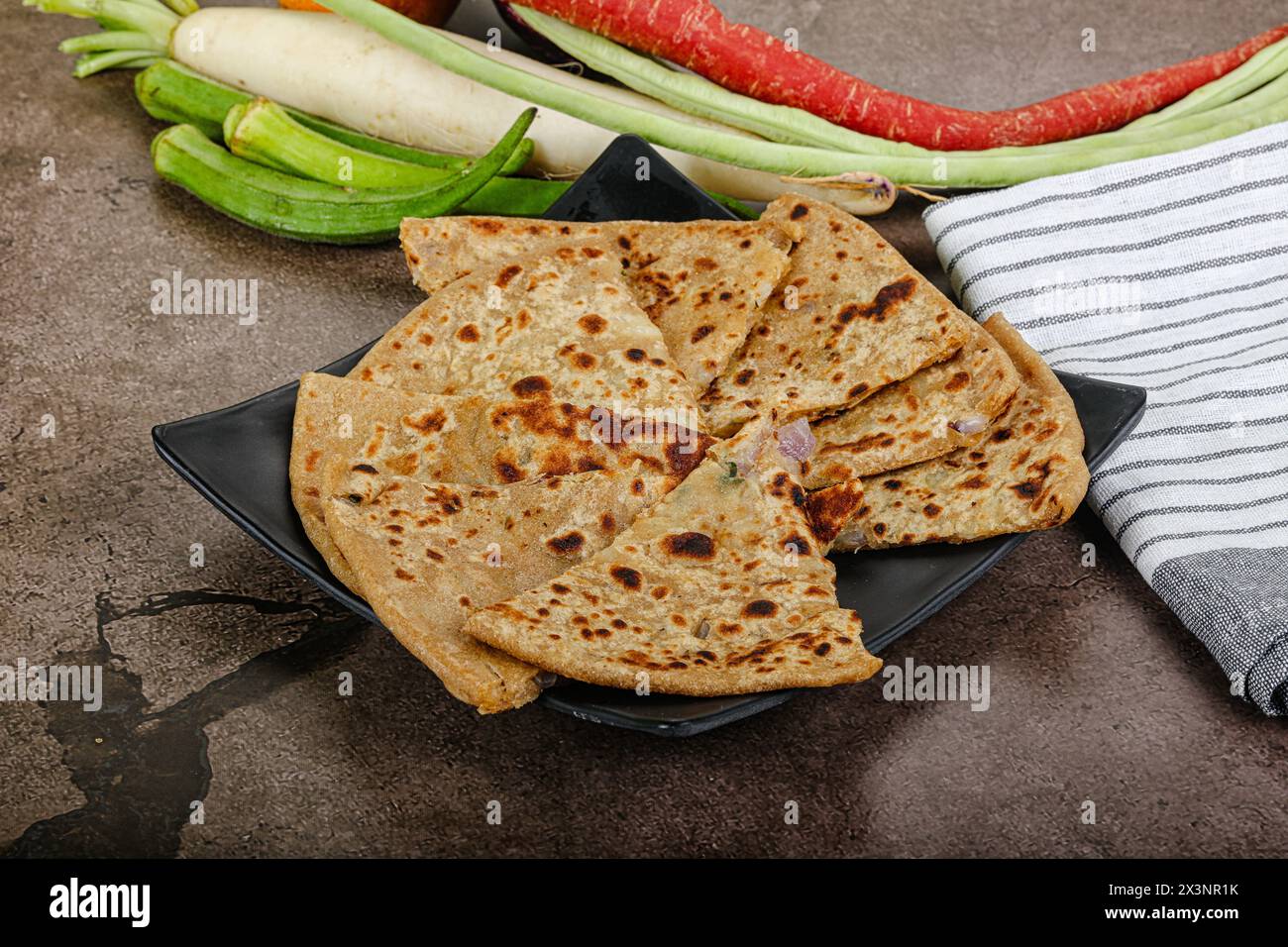 Indian vegetarian Aloo Paratha - bread with potato Stock Photo - Alamy