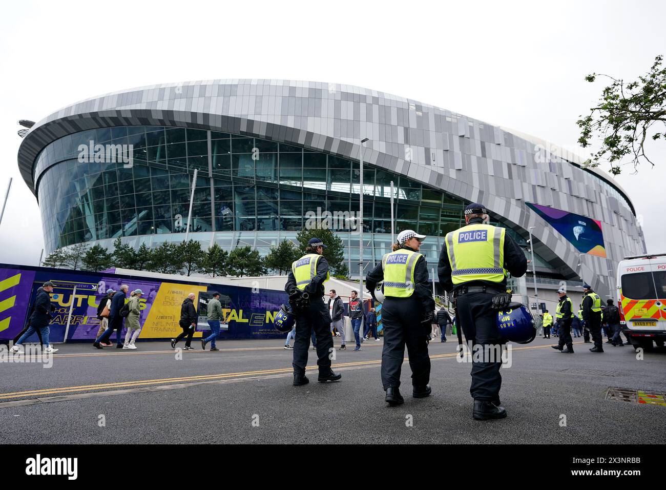 Police keep watch over fans near the ground before the Premier League ...