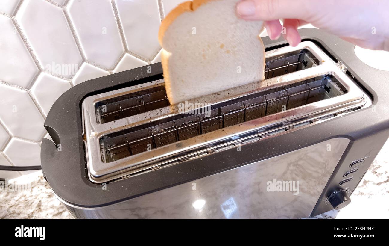Modern Toaster with Digital Display Toasting Bread in the Kitchen Stock ...