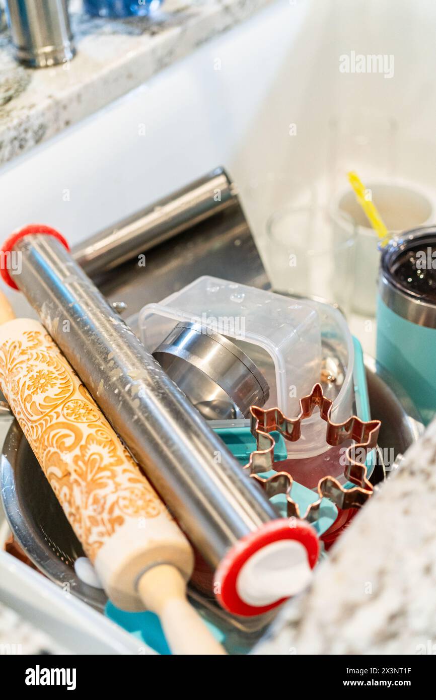 Post-Baking Cleanup: Dirty Dishes in the Sink Stock Photo - Alamy