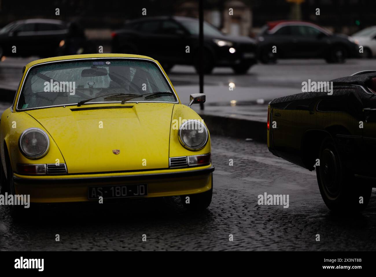 Yellow Porsche 911 type G spotted in the streets of Paris, France Stock ...