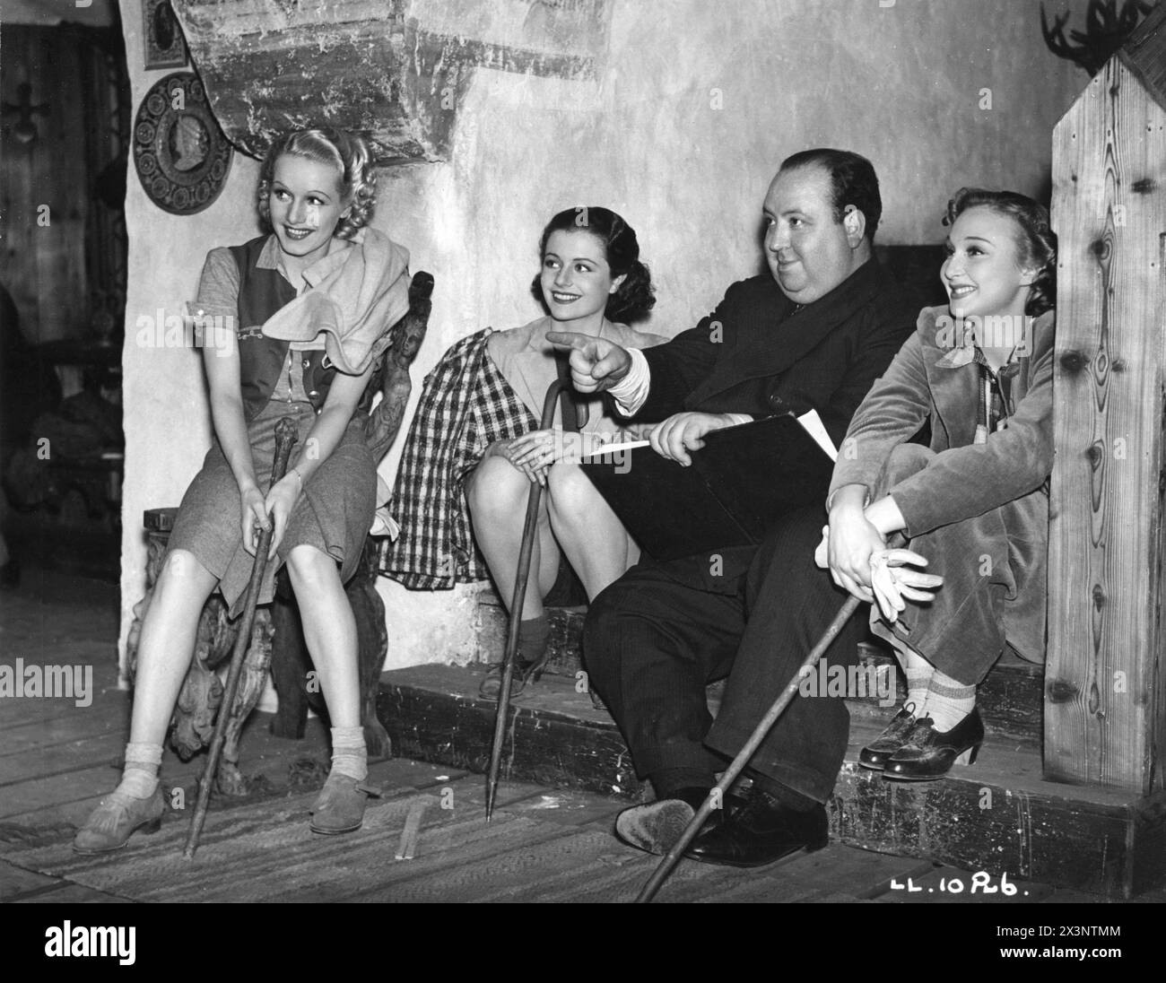 Director ALFRED HITCHCOCK with SALLY STEWART, MARGARET LOCKWOOD and ...