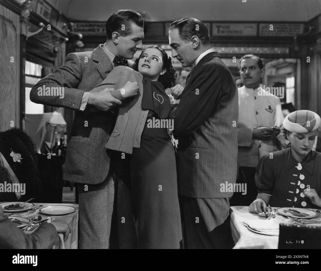 MICHAEL REDGRAVE, MARGARET LOCKWOOD and PAUL LUKAS in a scene from THE ...