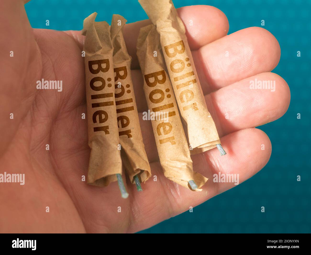 New Year's Eve Firecrackers In One Hand Stock Photo - Alamy