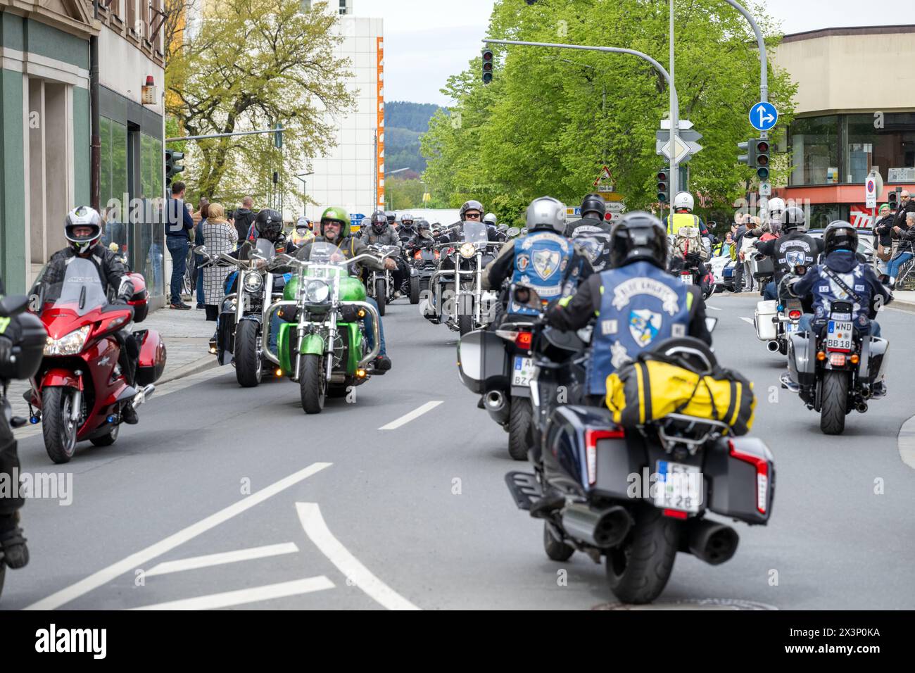 Kulmbach, Germany. 28th Apr, 2024. Numerous motorcycles ride in a ...