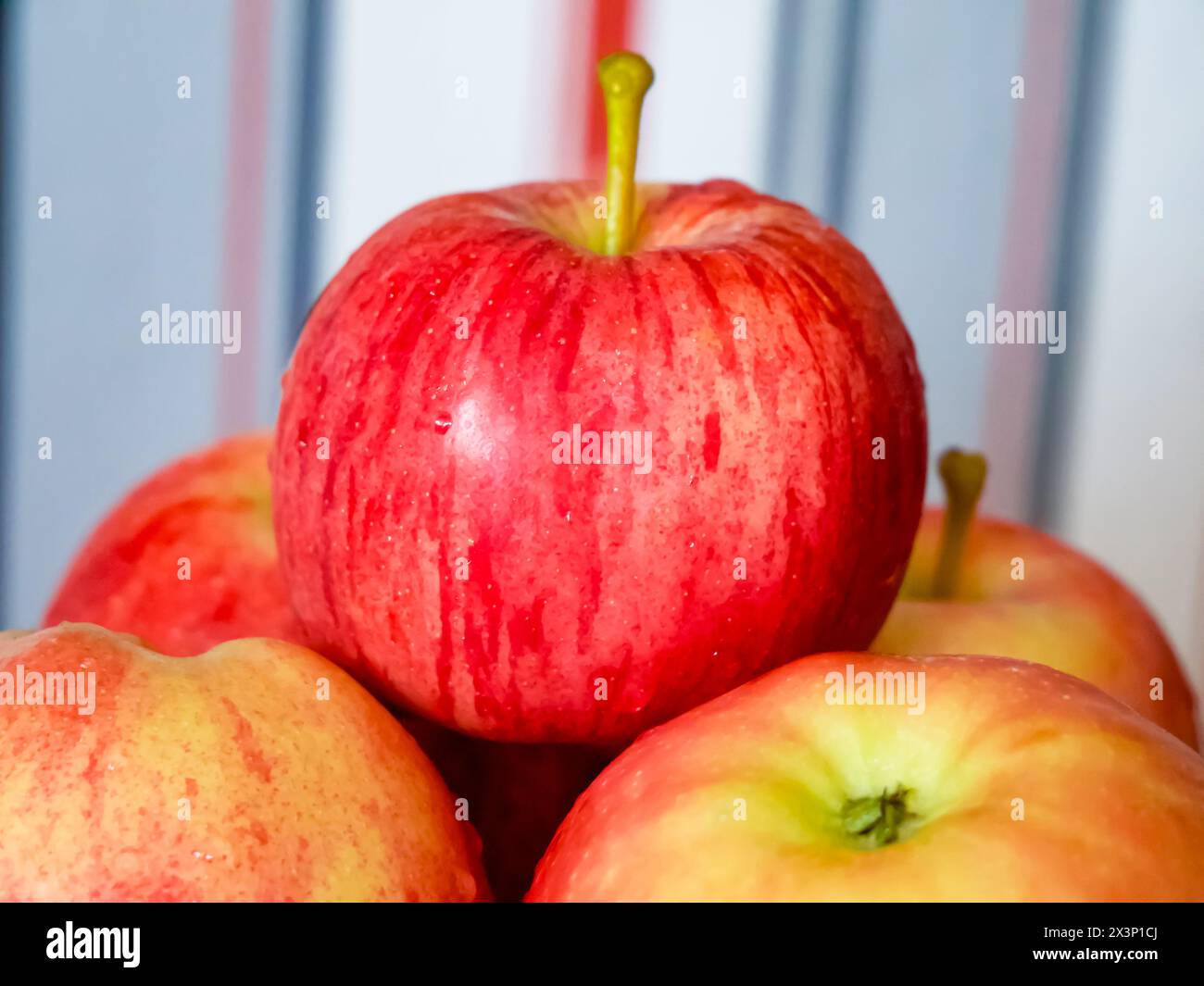 Crisp Red Apples. Freshly picked apples with water droplets, ideal for ...