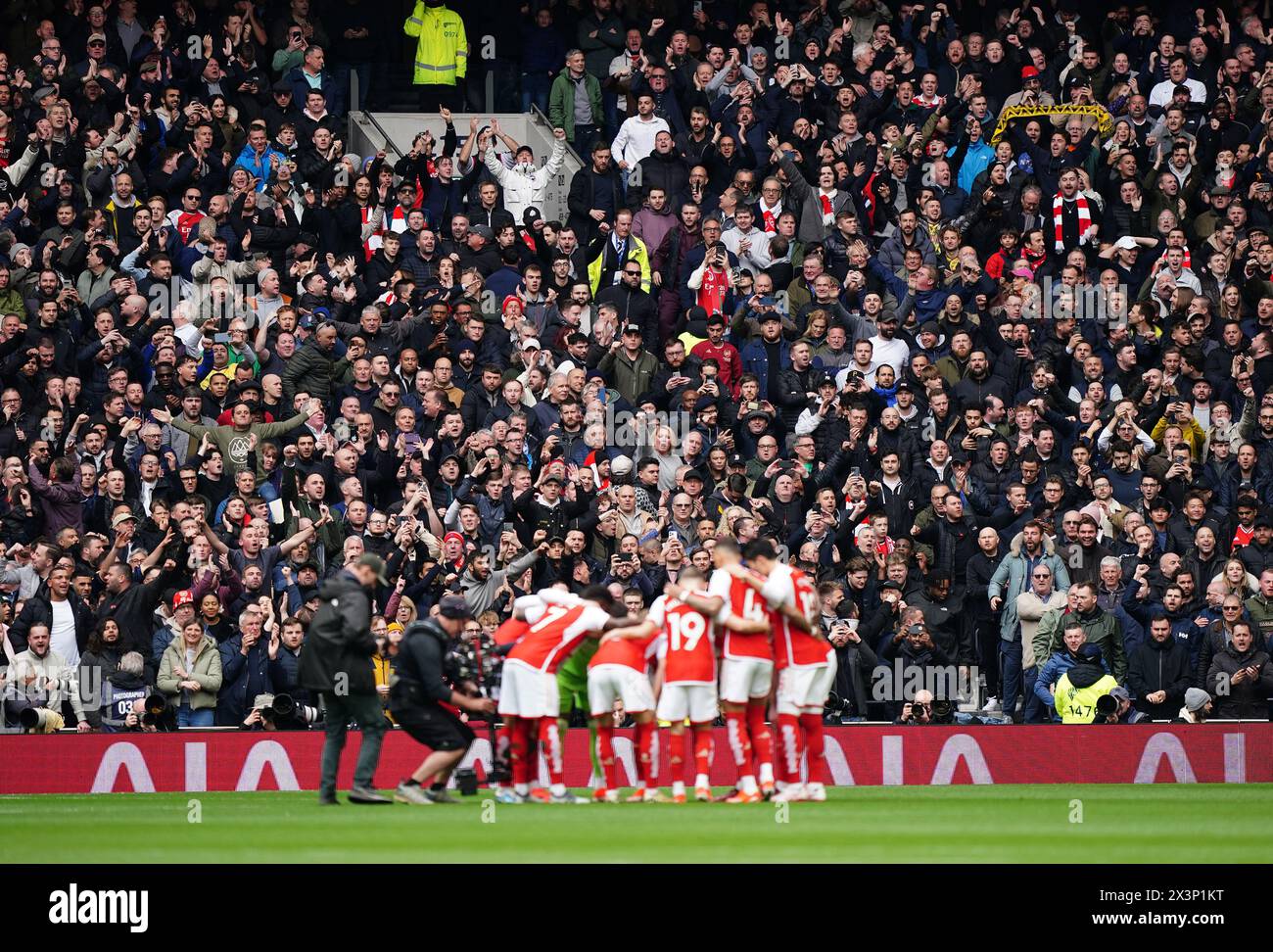 Arsenal fans show their support in the stands before the Premier League ...