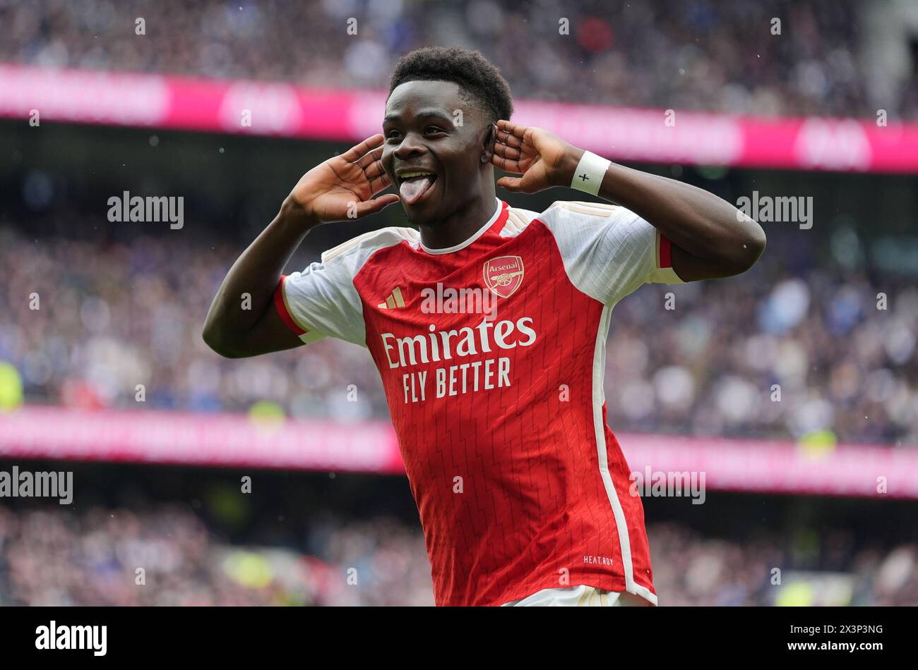 Arsenal's Bukayo Saka celebrates scoring their second goal of the game ...