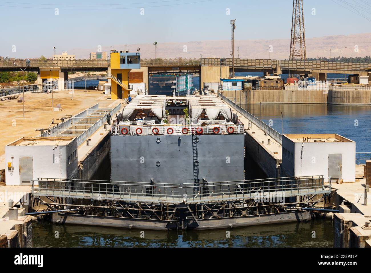 Nile cruise ship in the New Bridge, Electricity bridge, lock at Esna on ...