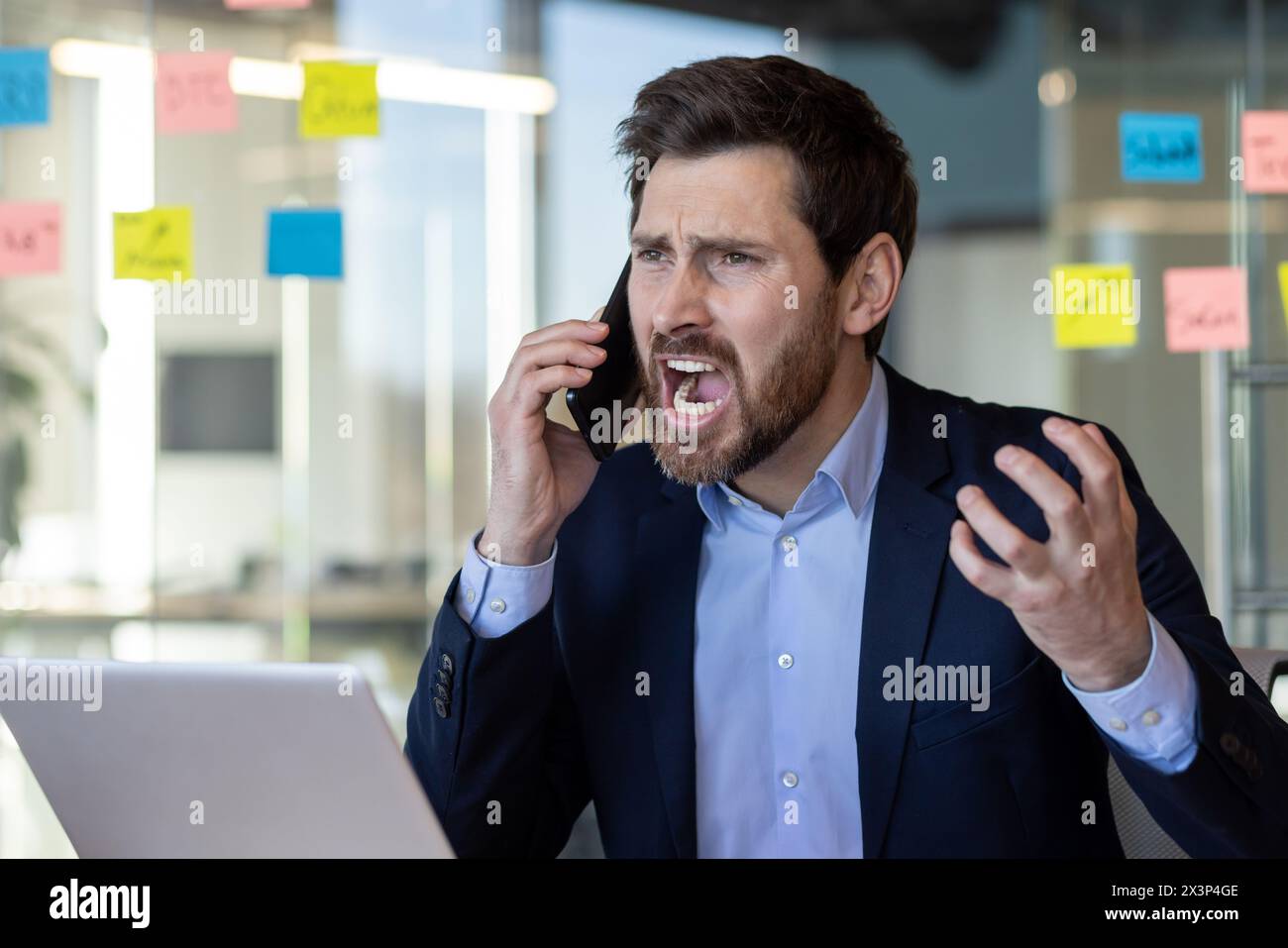 Angry mature boss in suit hi-res stock photography and images - Alamy