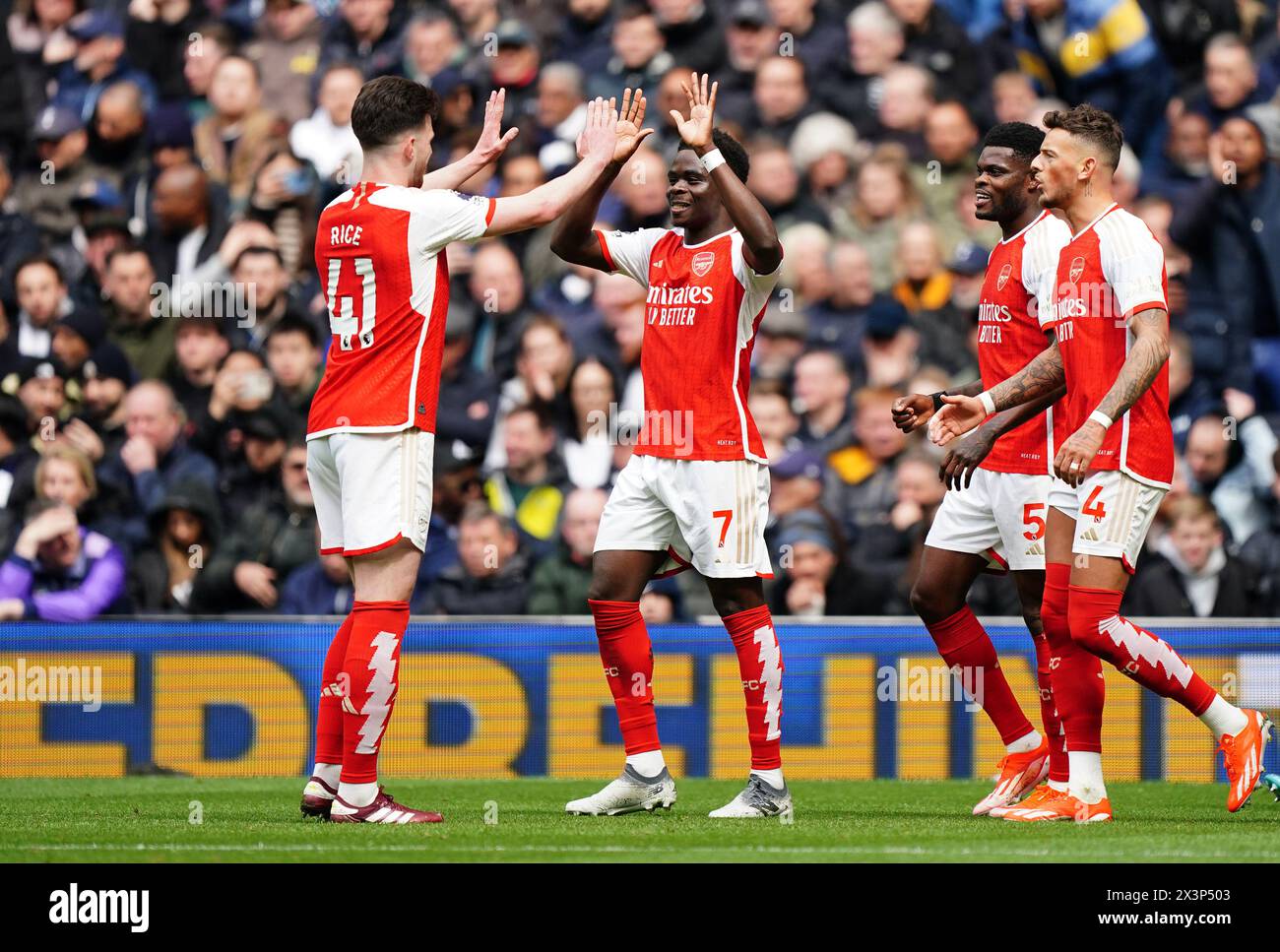 Arsenal's Declan Rice (left) and Bukayo Saka celebrate their third goal ...