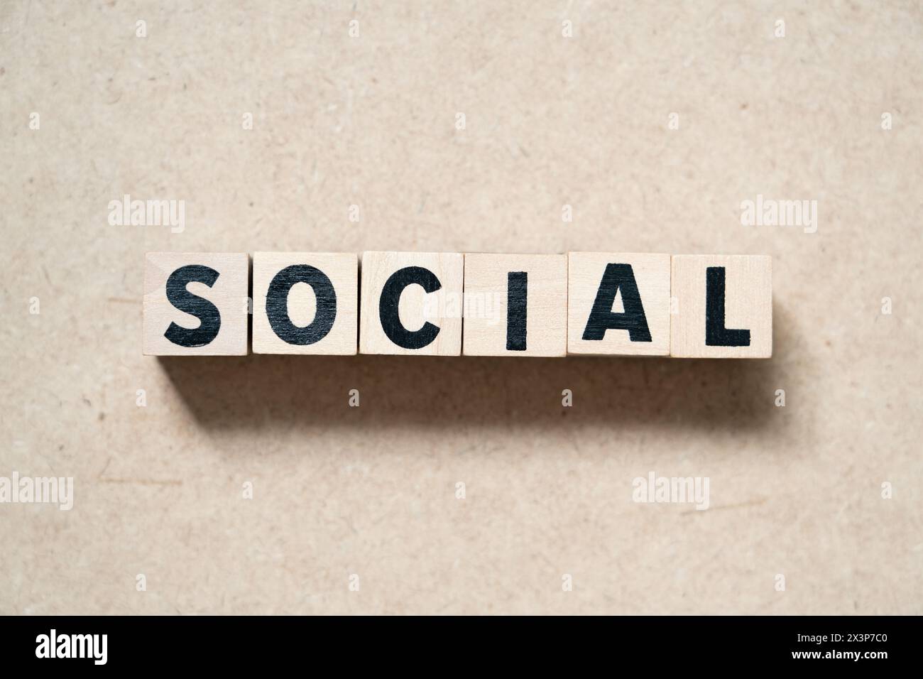 Alphabet letter block in word social on wood background Stock Photo - Alamy