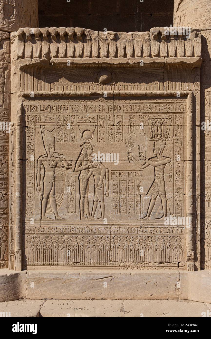 Relief of Roman emperor Trajan offering flowers and a sistrum to Hathor ...