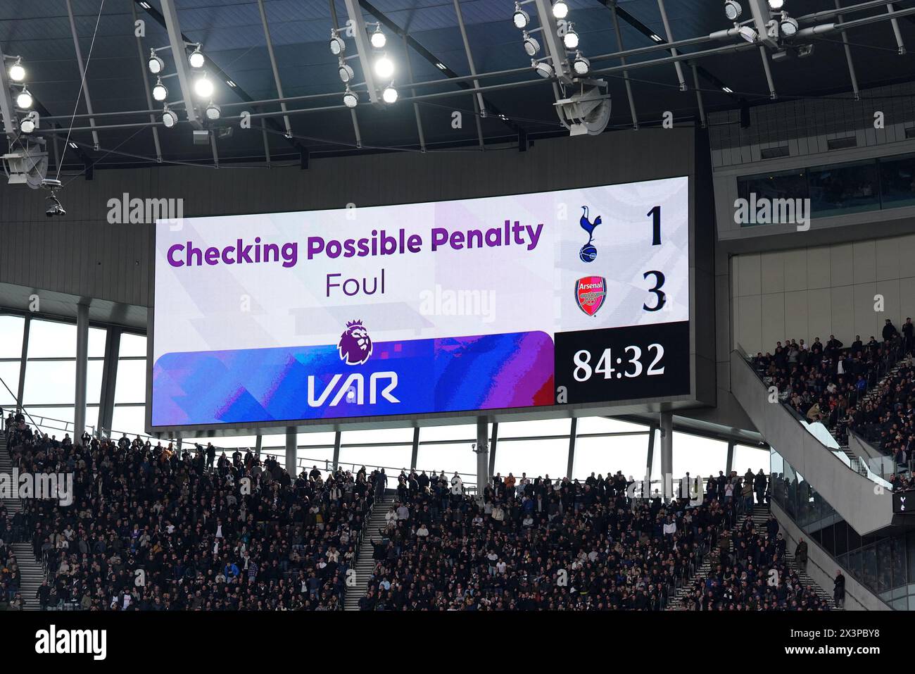 The big screen displays a VAR review before awarding Tottenham Hotspur ...