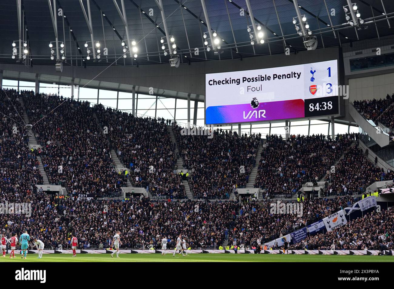 The big screen displays a VAR review before awarding Tottenham Hotspur ...