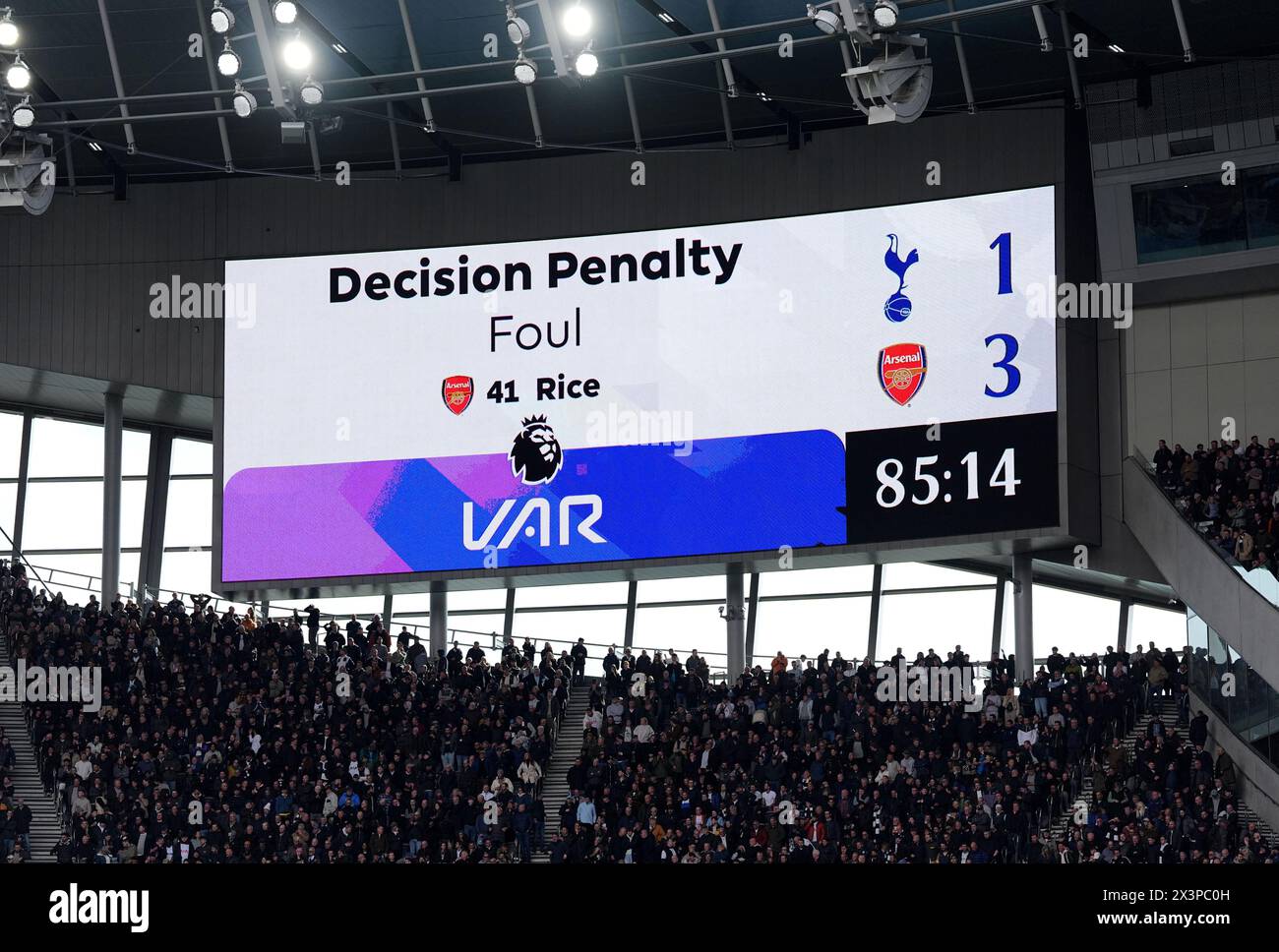 The big screen displays a VAR review before awarding Tottenham Hotspur ...