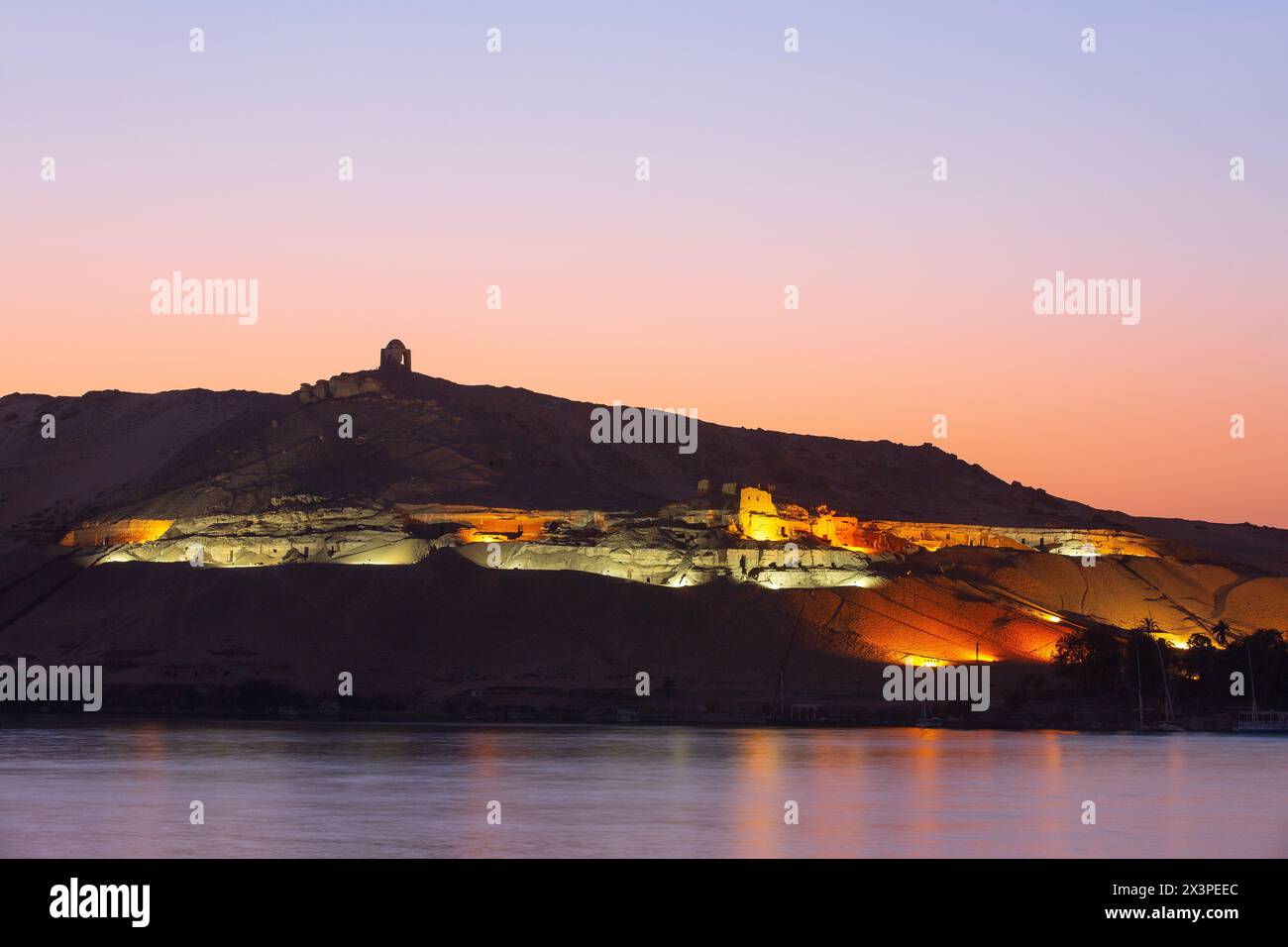 The tombs of the Nobles in Aswan, Egypt at twilight Stock Photo - Alamy