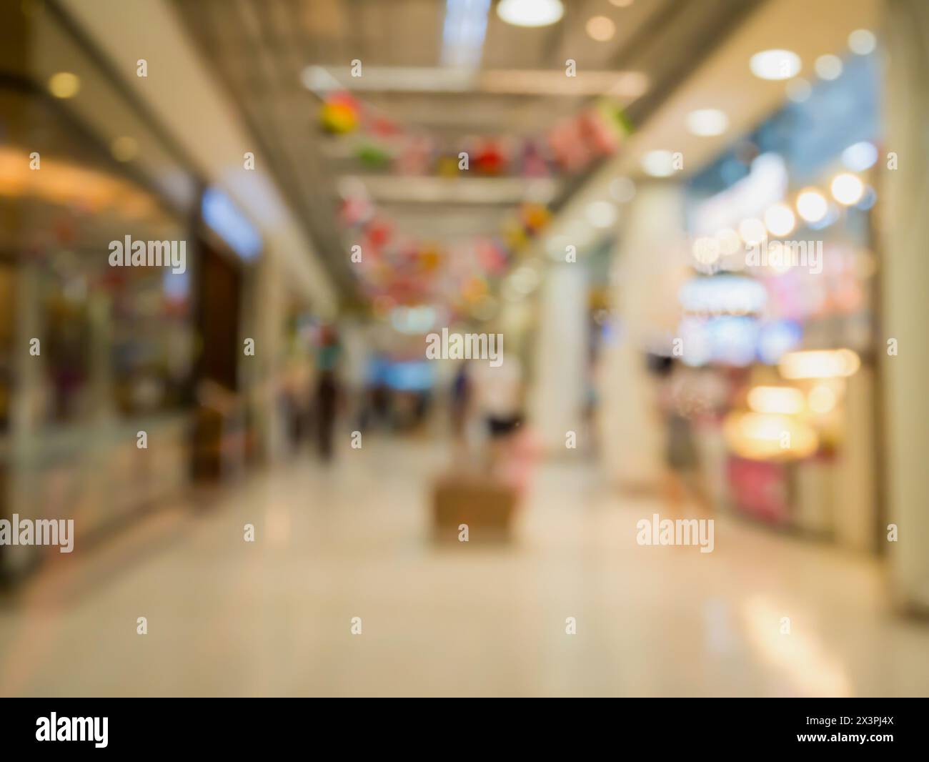 Shopping mall blur background with bokeh Stock Photo - Alamy