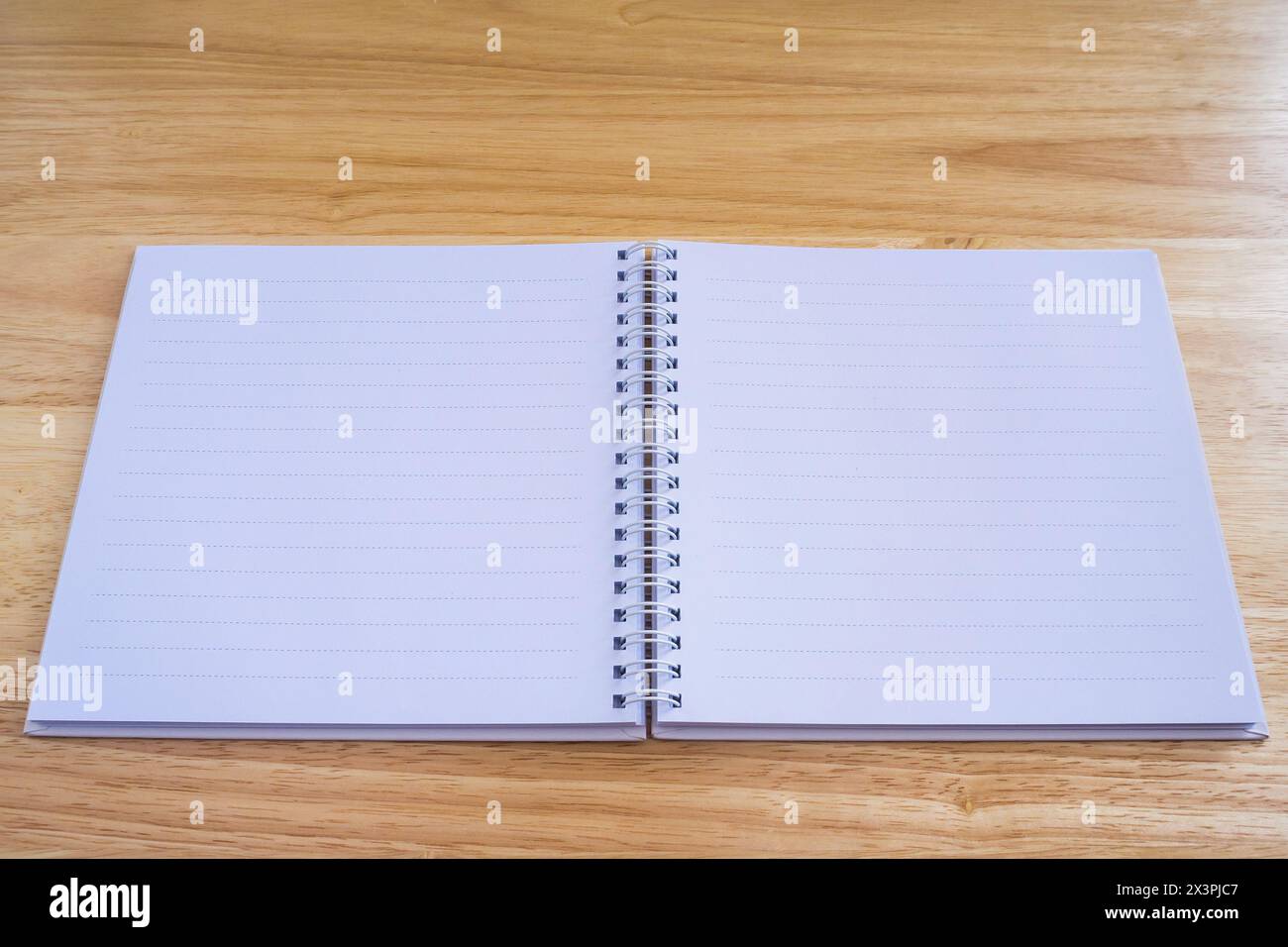 open notebook on wood table background Stock Photo - Alamy