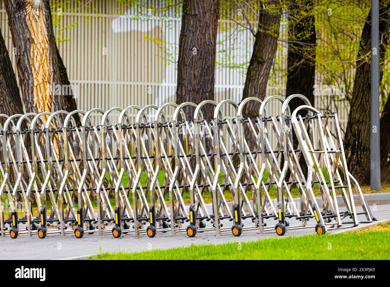 sliding barrier on wheels in unfolded position. sliding barrier on ...