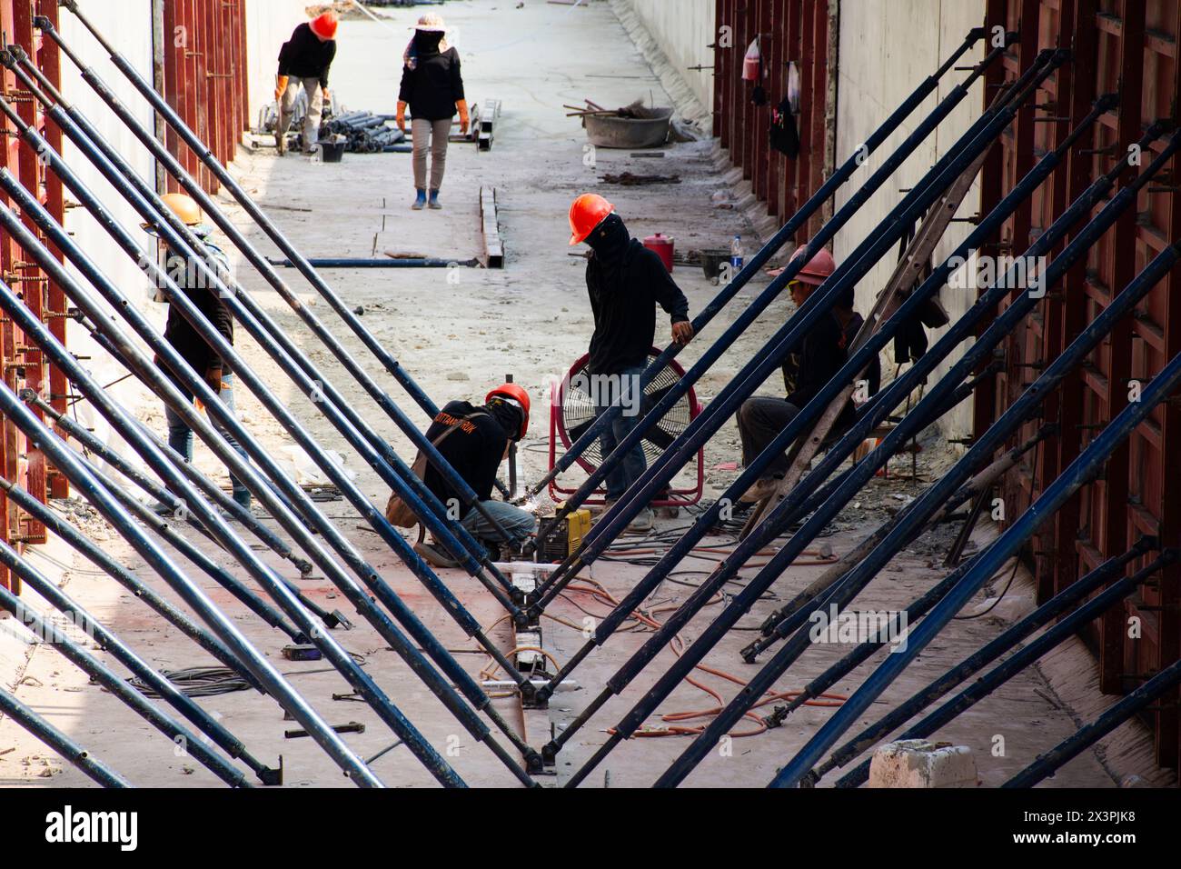 Asian labor people and thai labour workers use machine tool and heavy ...