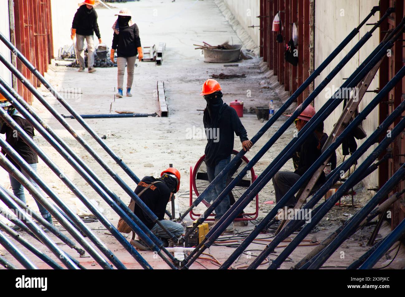 Asian labor people and thai labour workers use machine tool and heavy ...