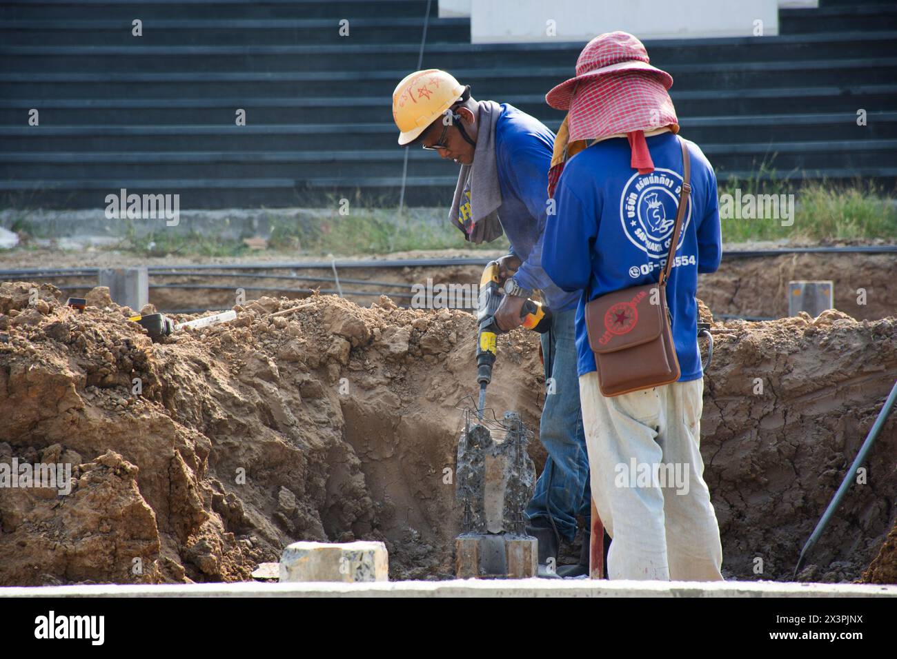 Asian labor people and thai labour workers use machine tool and heavy ...