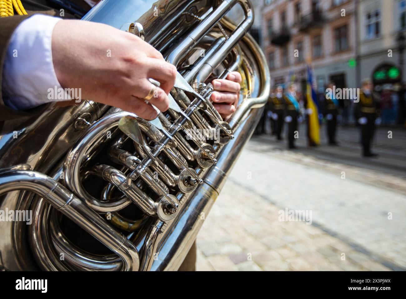 Closeup of hands playing tuba for design purpose Stock Photo - Alamy