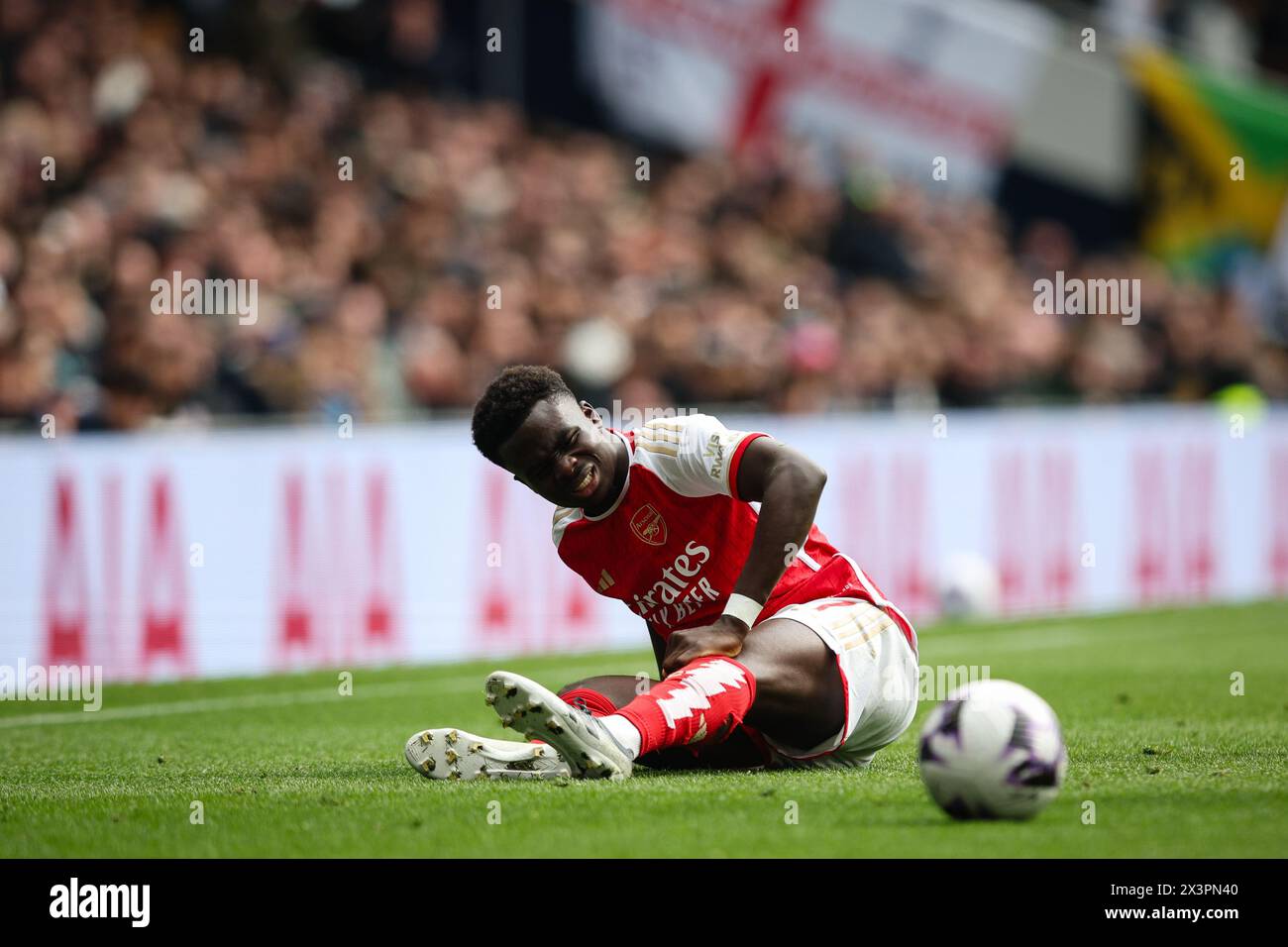 LONDON, UK - 28th Apr 2024: Bukayo Saka of Arsenal down injured during ...