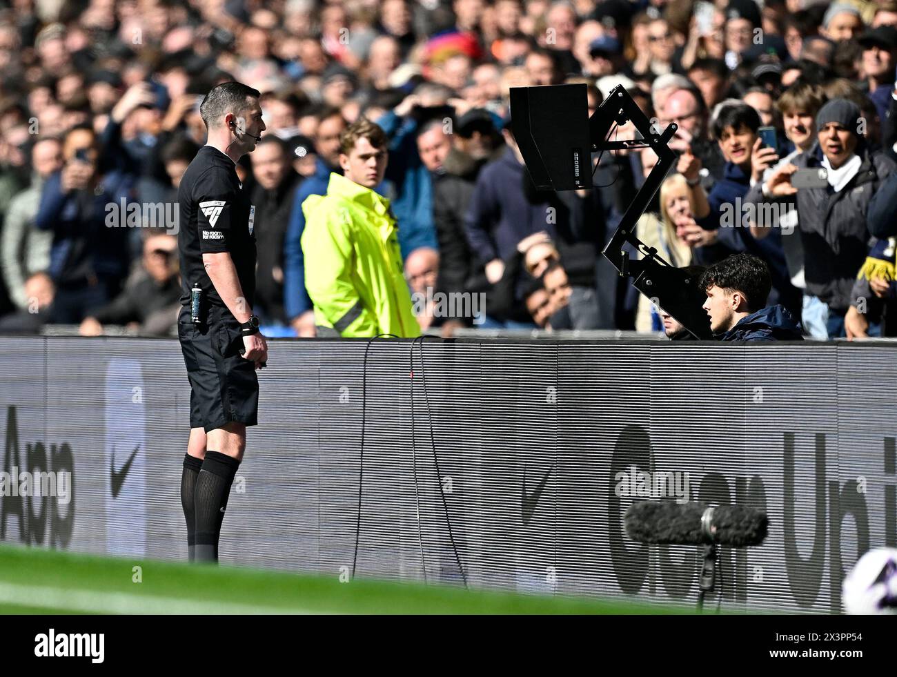 London, UK. 28th Apr, 2024. Michael Oliver (Referee) looks at the VAR ...