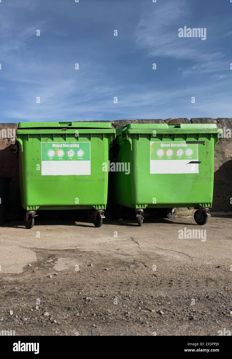 Wheelie bins in row segregated for recycling rubbish Stock Photo - Alamy