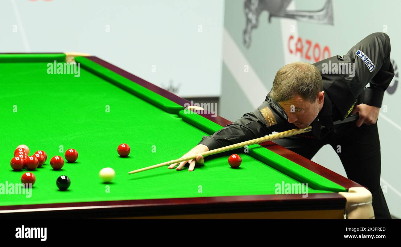 Jack Lisowski plays a shot during his match with Stuart Bingham, on day ...
