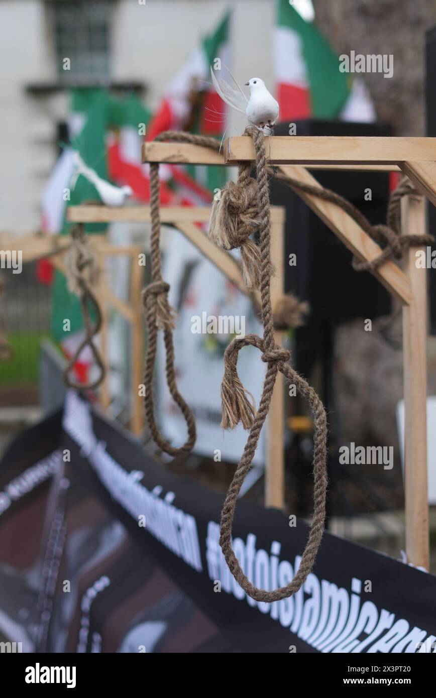 Mock gallows erected during a protest opposite Downing Street, in ...