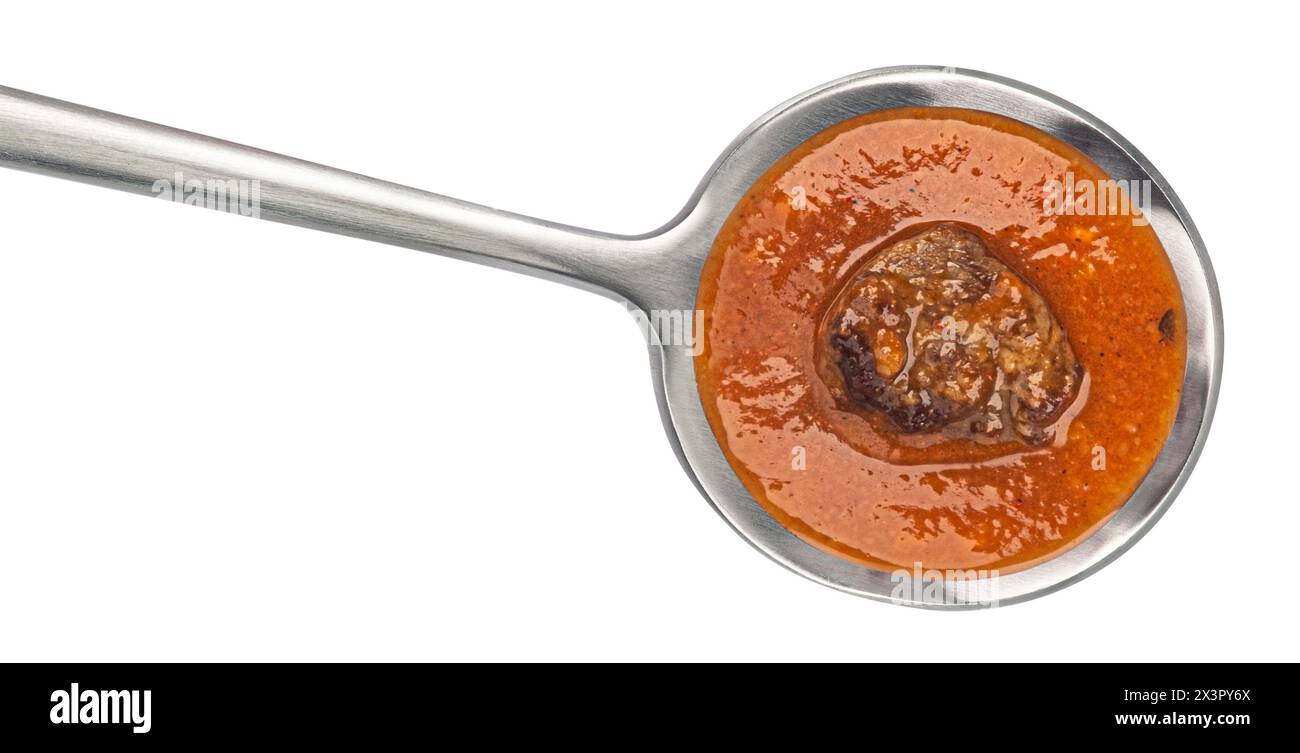 Beef stew in spoon isolated on white background, top view, full depth ...