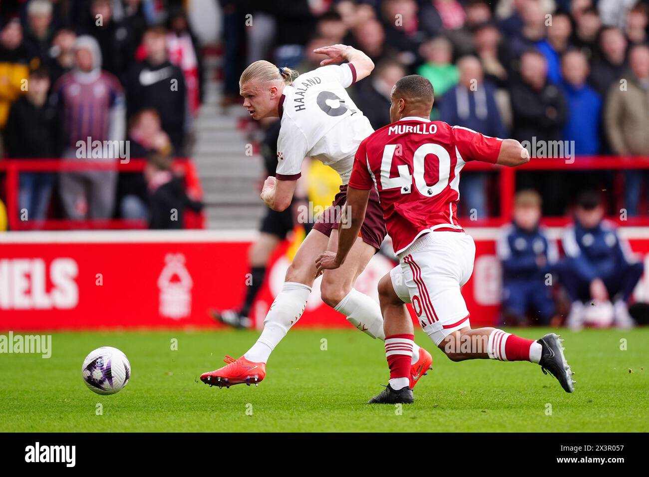Manchester City's Erling Haaland (left) scores their side's second goal ...
