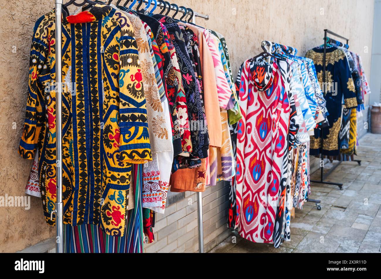 arab silk dresses with colorful pattern in oriental street bazaar in ...