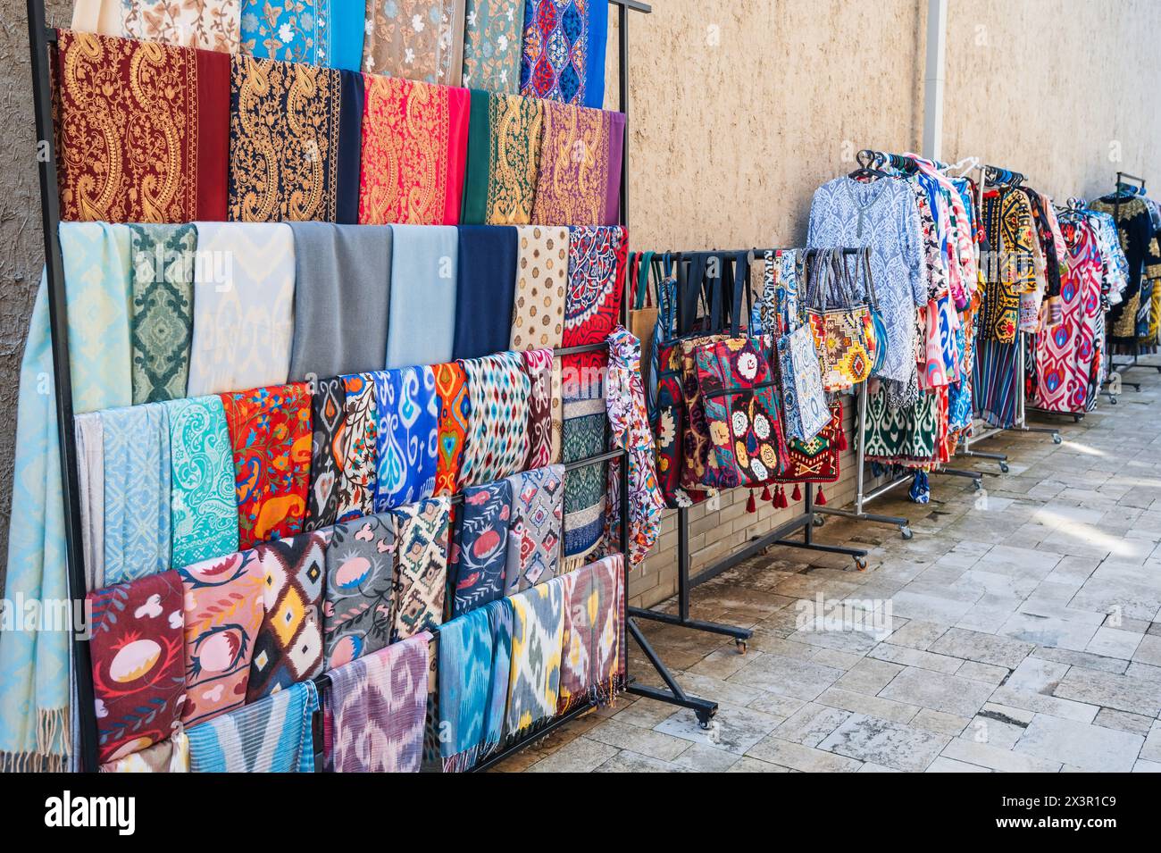 silk scarves, fabric bags and dresses with a traditional bright ...