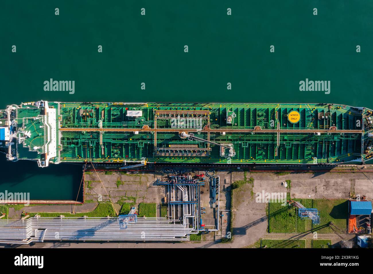 Aerial top down view oil ship tanker vessel loading in gas and oil ...