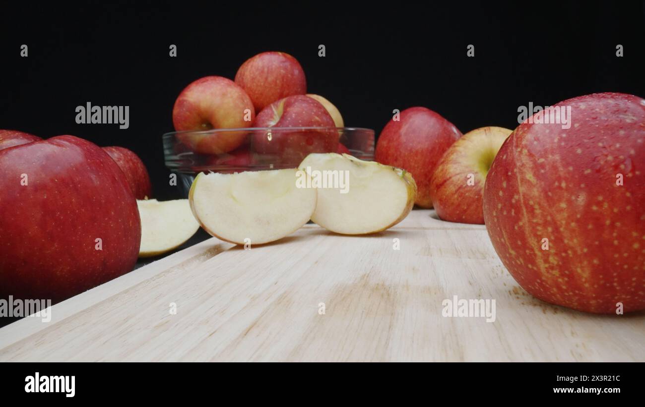 Macrography of apples displayed in various forms: whole, sliced, and ...