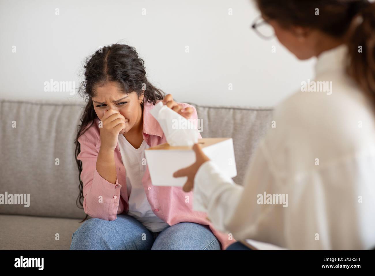 Upset young woman counseling hi-res stock photography and images - Alamy
