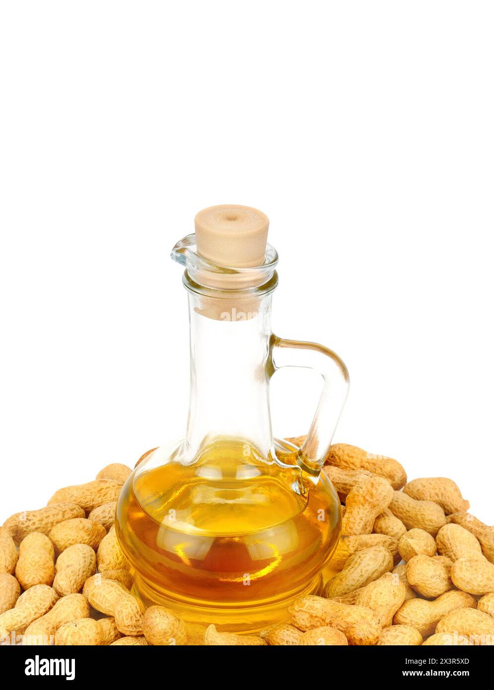 Peanut oil in a glass bottle with peanuts. Free space for text Stock ...