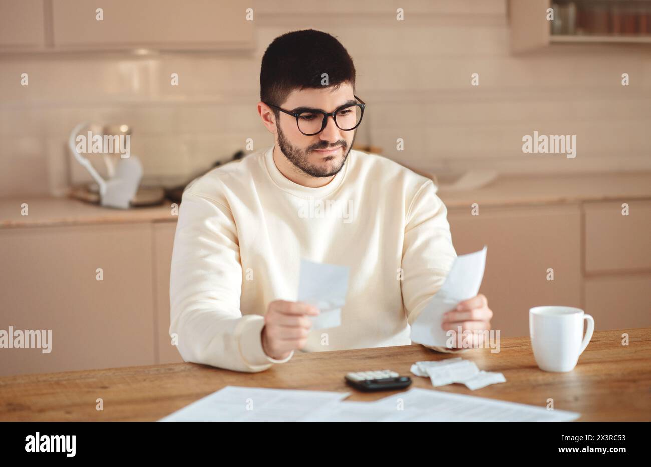Seated man table pen hi-res stock photography and images - Alamy